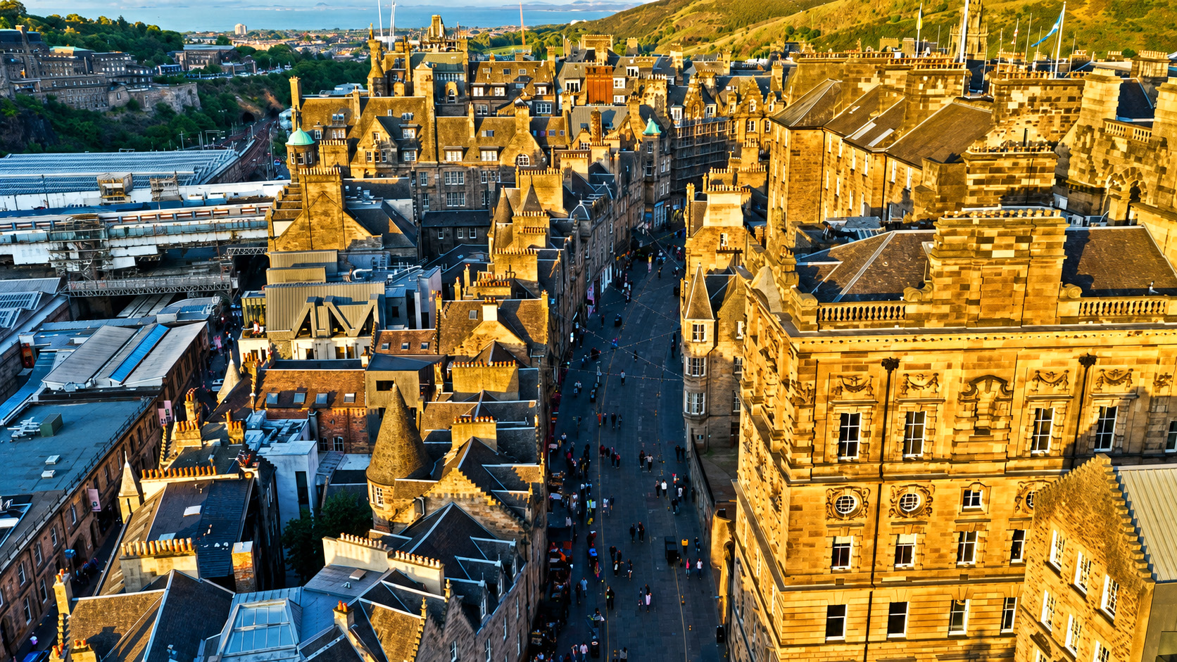 Edinburgh’s medieval skyline glowing in golden hour light