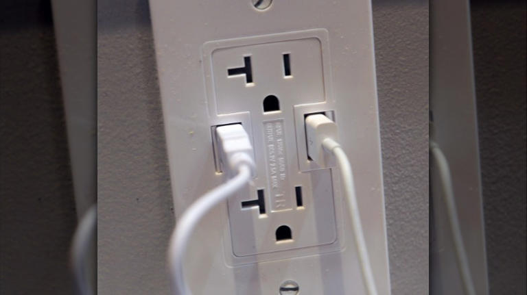 Why do some electrical outlets have a T-shaped hole?
