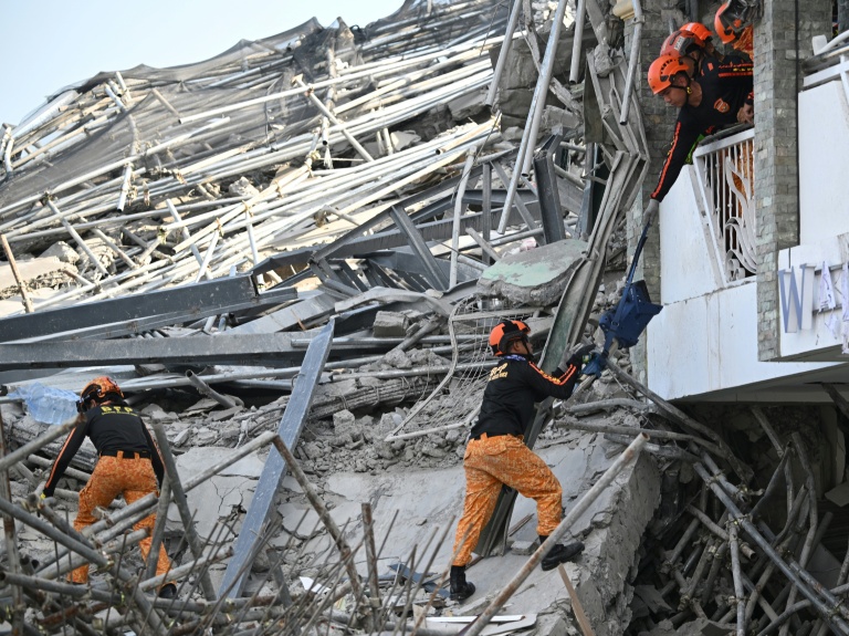 Rescuers search for 20 missing after Philippine building collapse