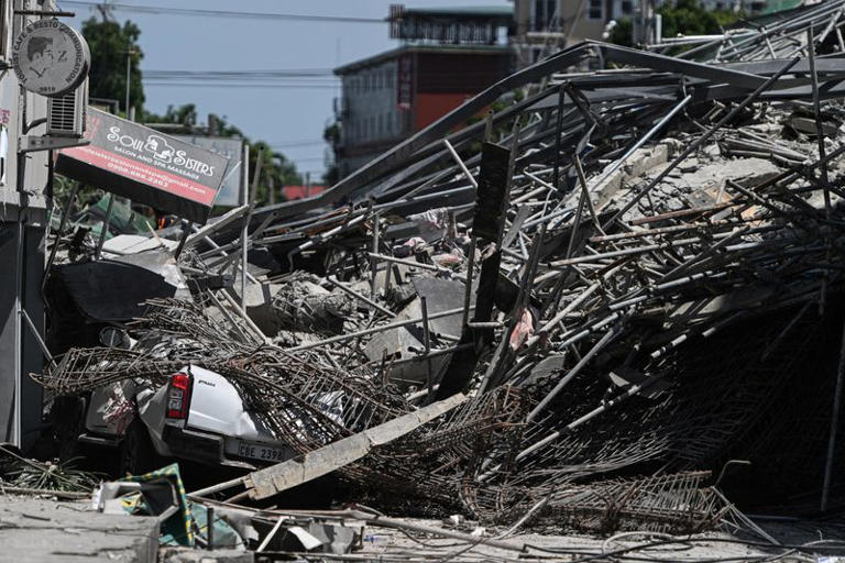 At least one dead in Philippine building collapse, 21 people missing