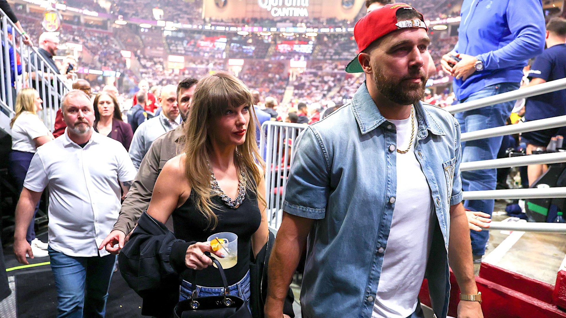 Taylor Swift and Travis Kelce cheer on Cavaliers courtside at NBA game