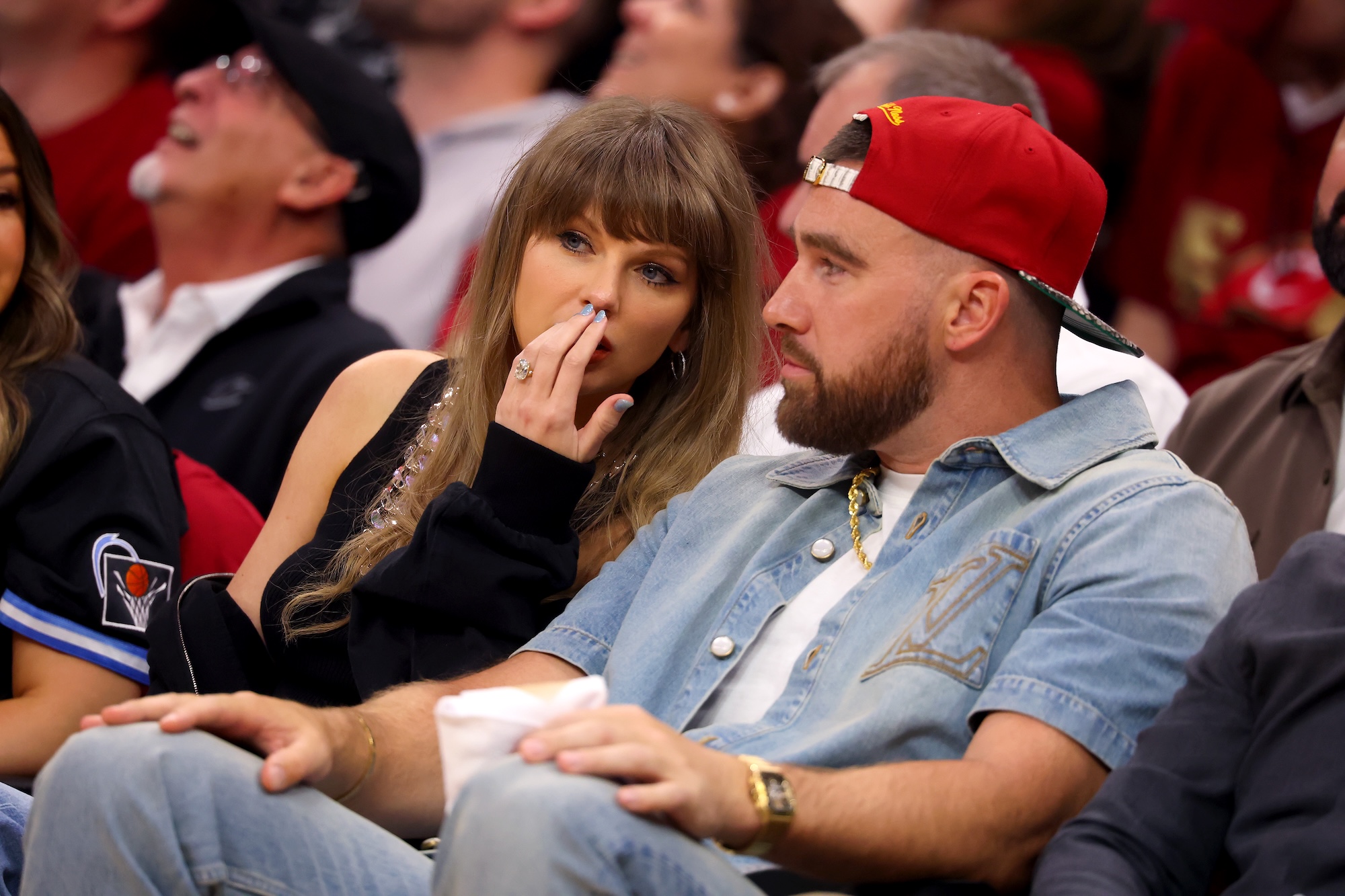 Taylor Swift and Travis Kelce cheer on Cavaliers courtside at NBA game