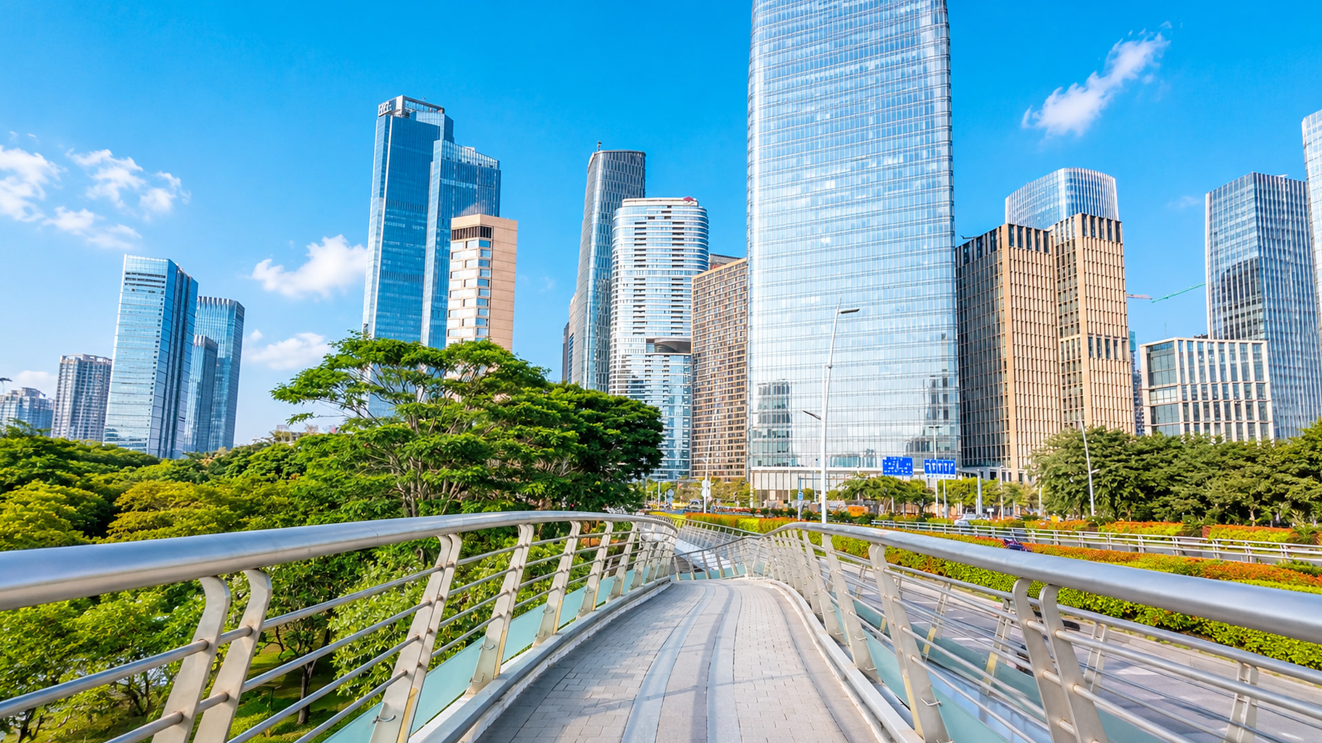 A quiet river walk between China’s dense urban glass towers