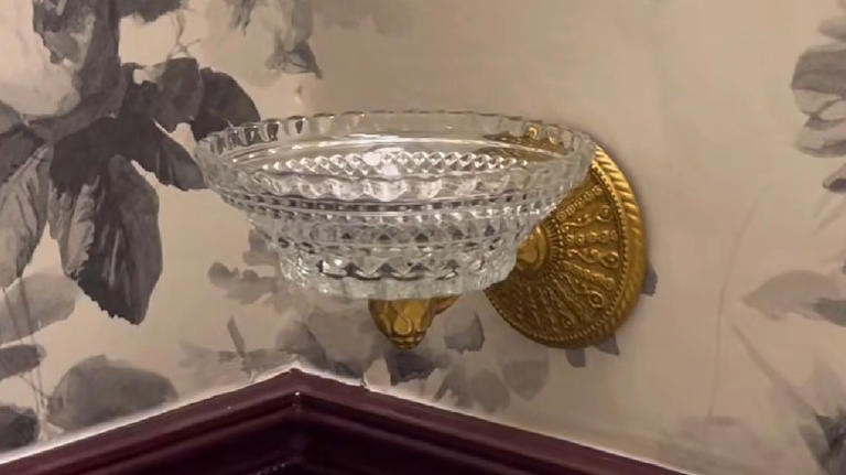 Use an old candle holder for budget-friendly bathroom storage with this ...