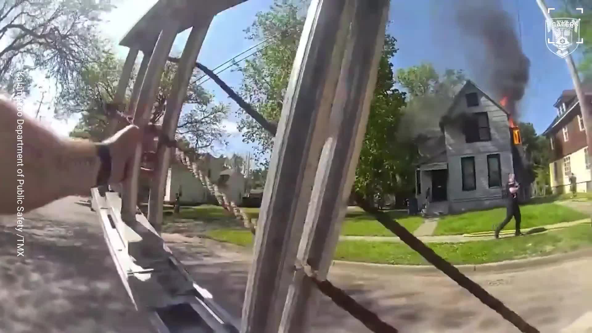 Baby dropped from second-floor window to police officer during house ...