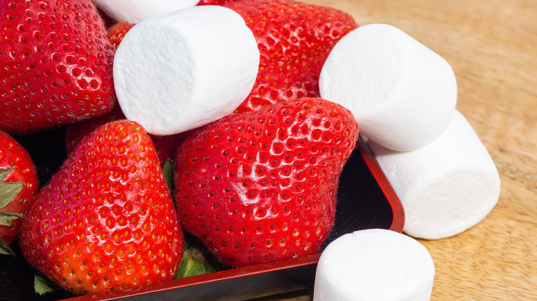 Forget chocolate-covered strawberries — wrap them in melted ...