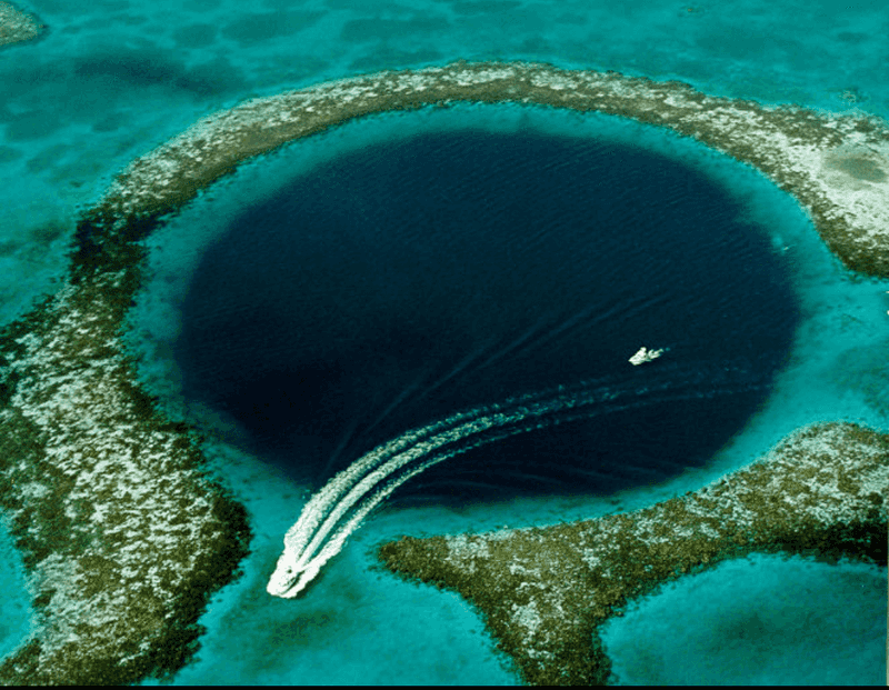 These 14 massive sinkholes look like gateways to another world