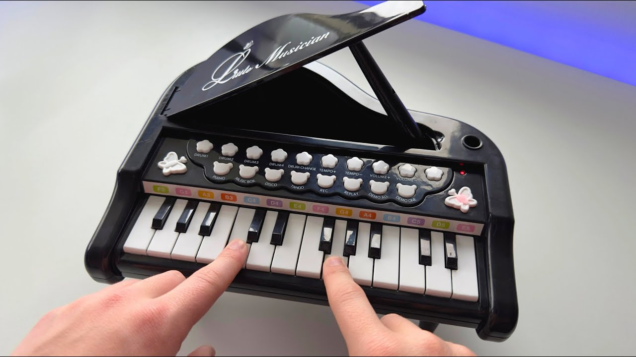 Playing a real song on a $15 grand piano is impressive