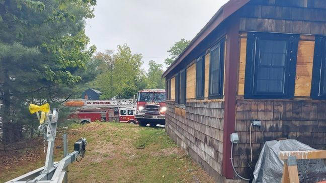 Sebago shed fire scorches nearby woods