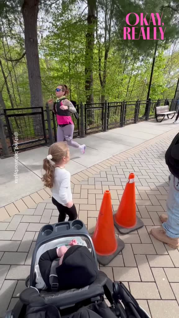 Mom completes half marathon in New York as toddler joins in emotional ...