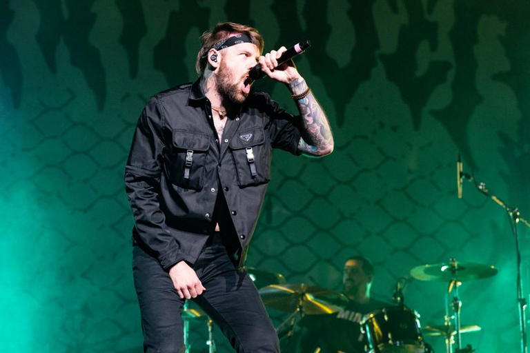 Rock star's wife speaks out after he comes out as 'proudly gay man ...