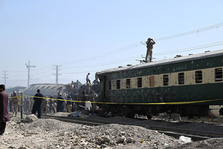 At least 14 people killed in bombing attack near moving passenger train
