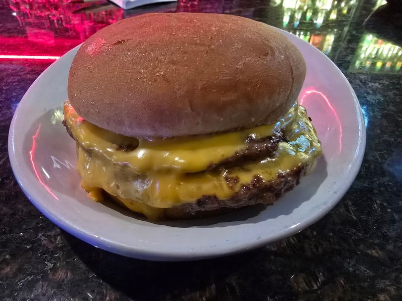 This tiny Indiana tavern serves a burger so big it looks illegal