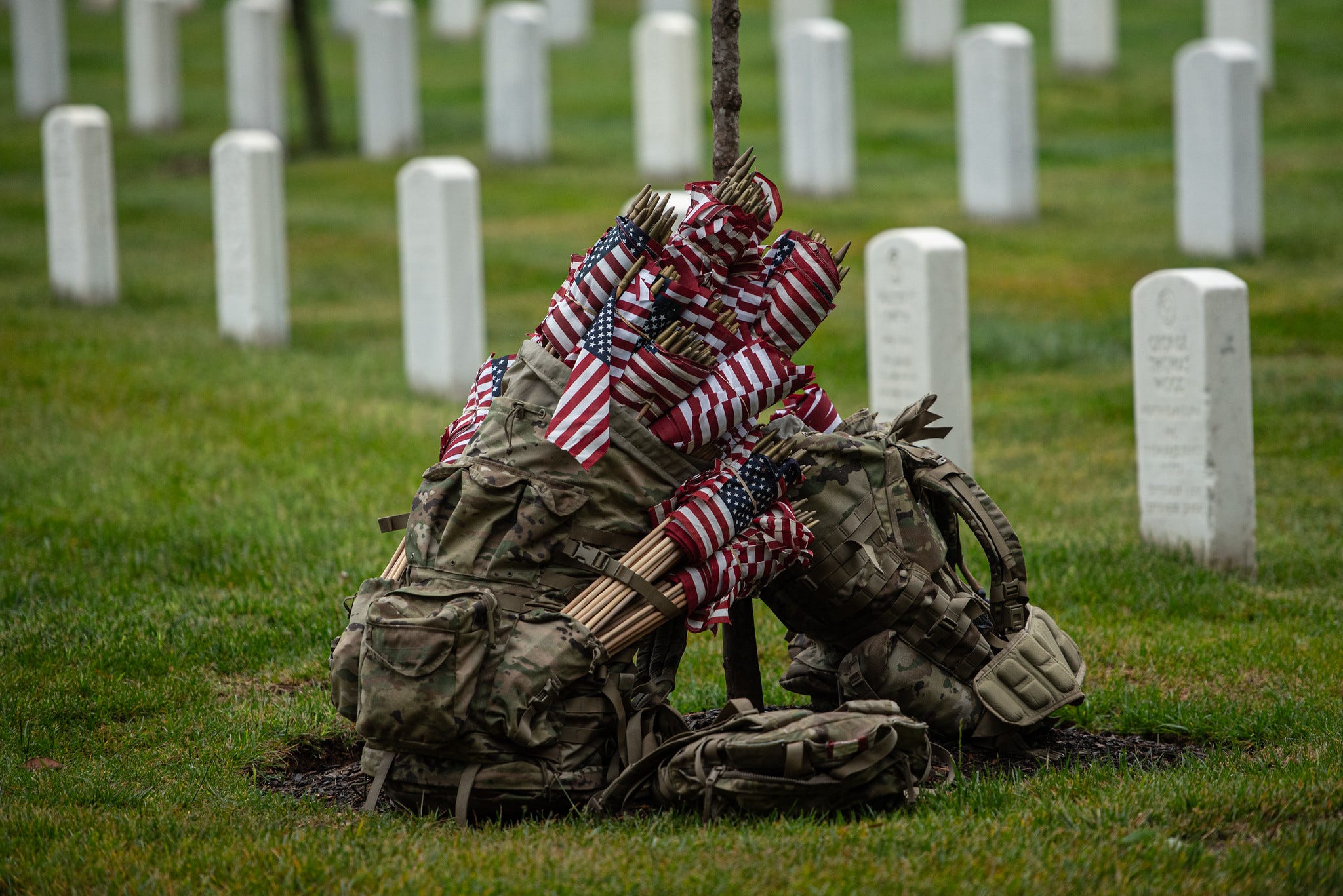 Army's Old Guard places flags at Arlington National Cemetery
