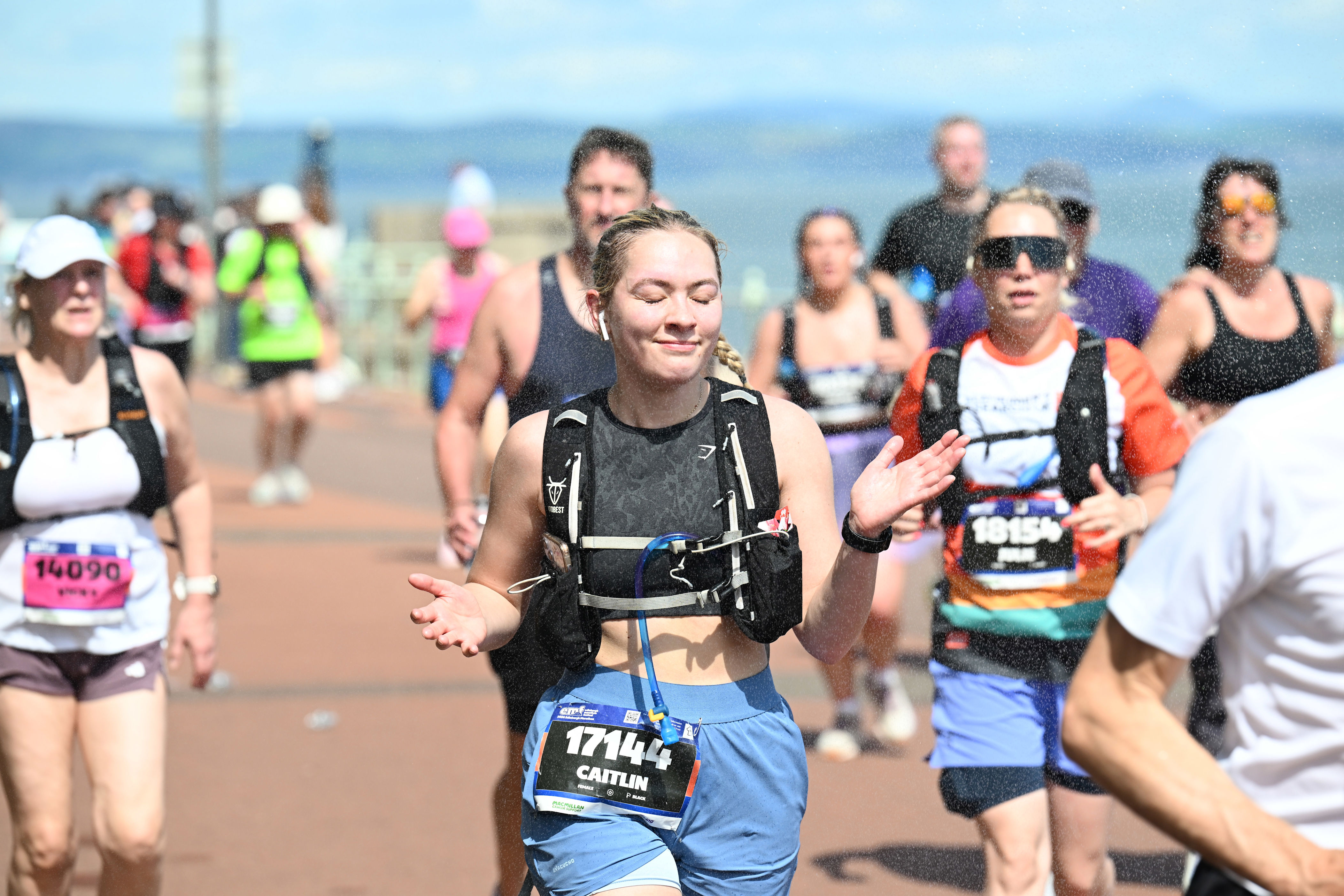 Feeling the heat: Marathon runners swelter in soaring temperatures