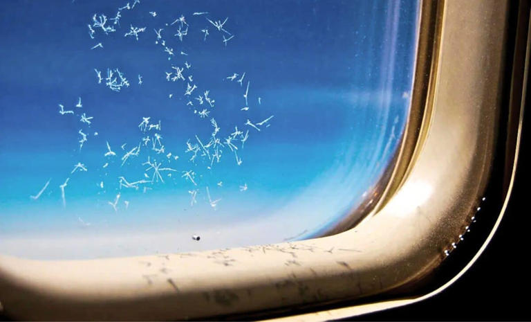 That small hole at the bottom of airplane windows: What it’s for and ...