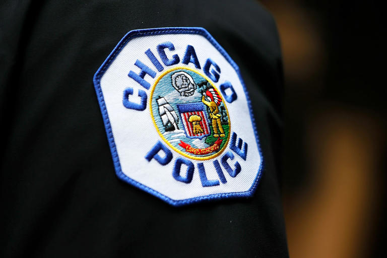 5 Chicago officers struck by car while dispersing a crowd