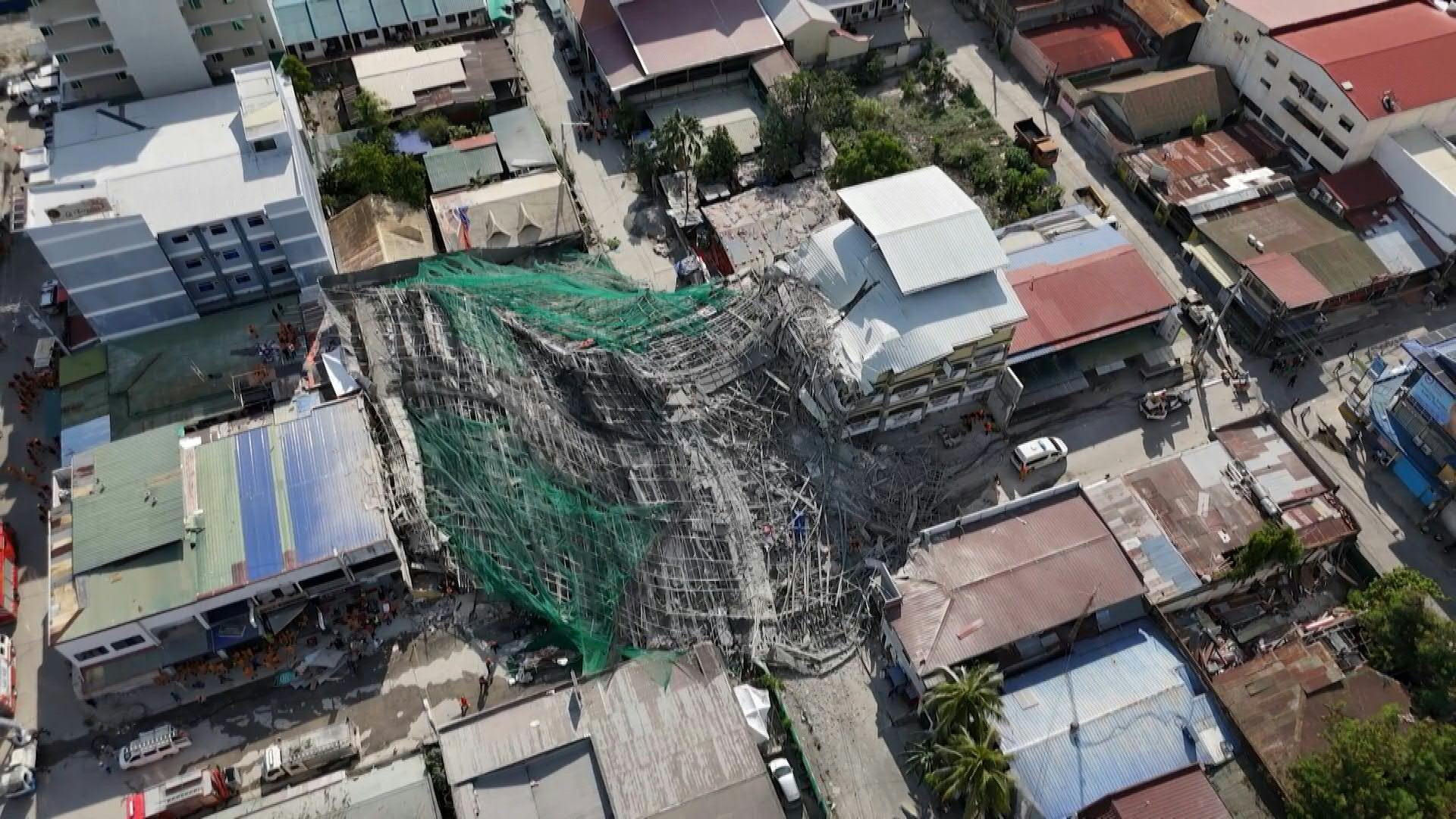 Rescuers search for 20 missing after Philippines building collapse