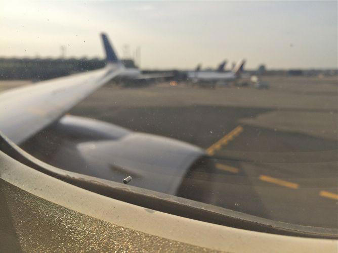 That small hole at the bottom of airplane windows: What it’s for and ...
