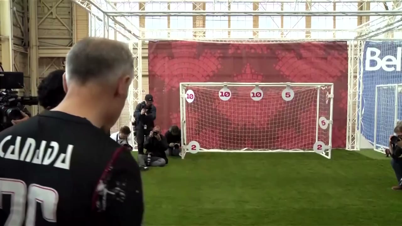 Carney shows off soccer skills on World Cup trophy tour