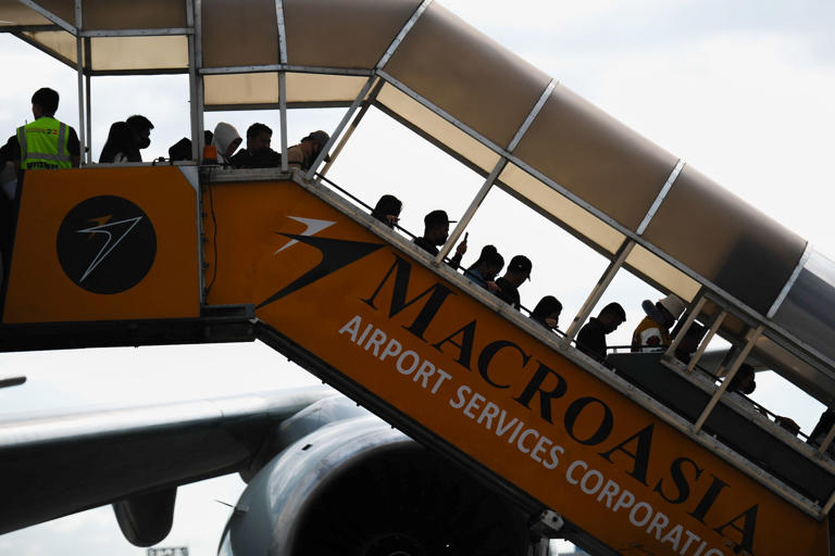 Over 10,000 Filipinos repatriated from Middle East amid conflict -- DMW