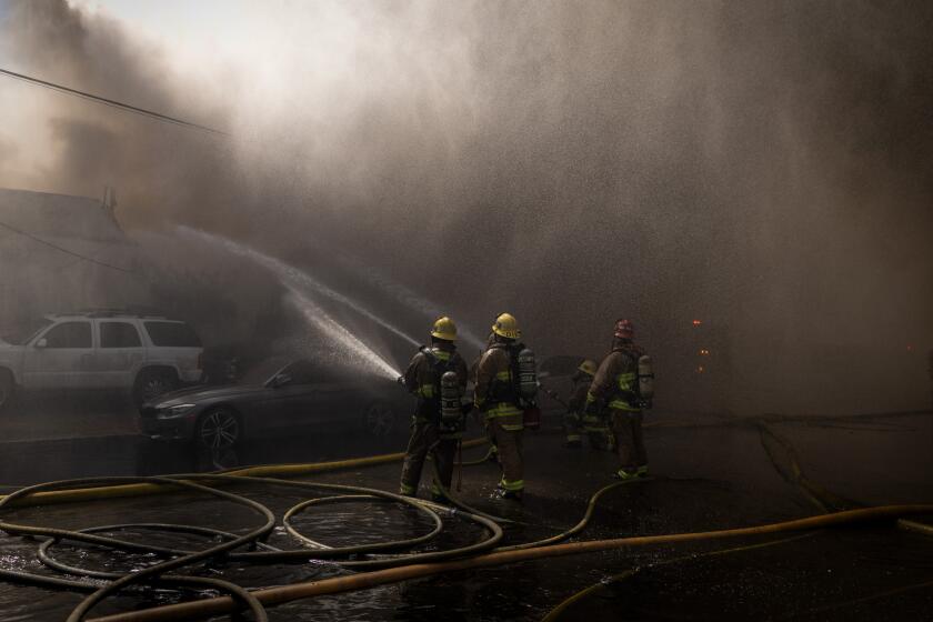 Crews knock down South Gate fire at tire recycling center that prompted ...