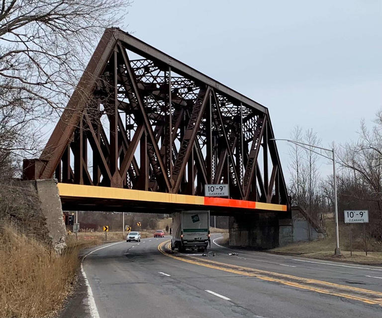 Cement truck hits rail bridge on Onondaga Lake Parkway