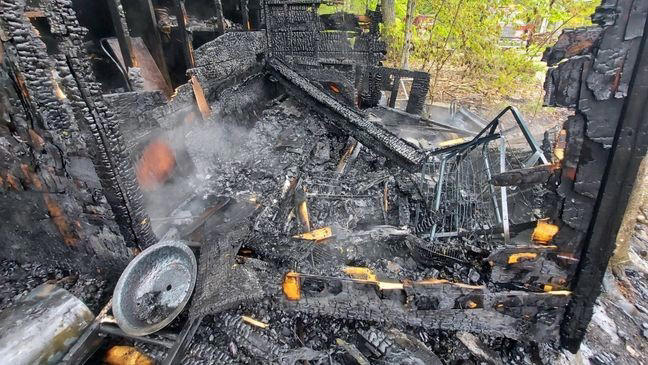 Sebago shed fire scorches nearby woods