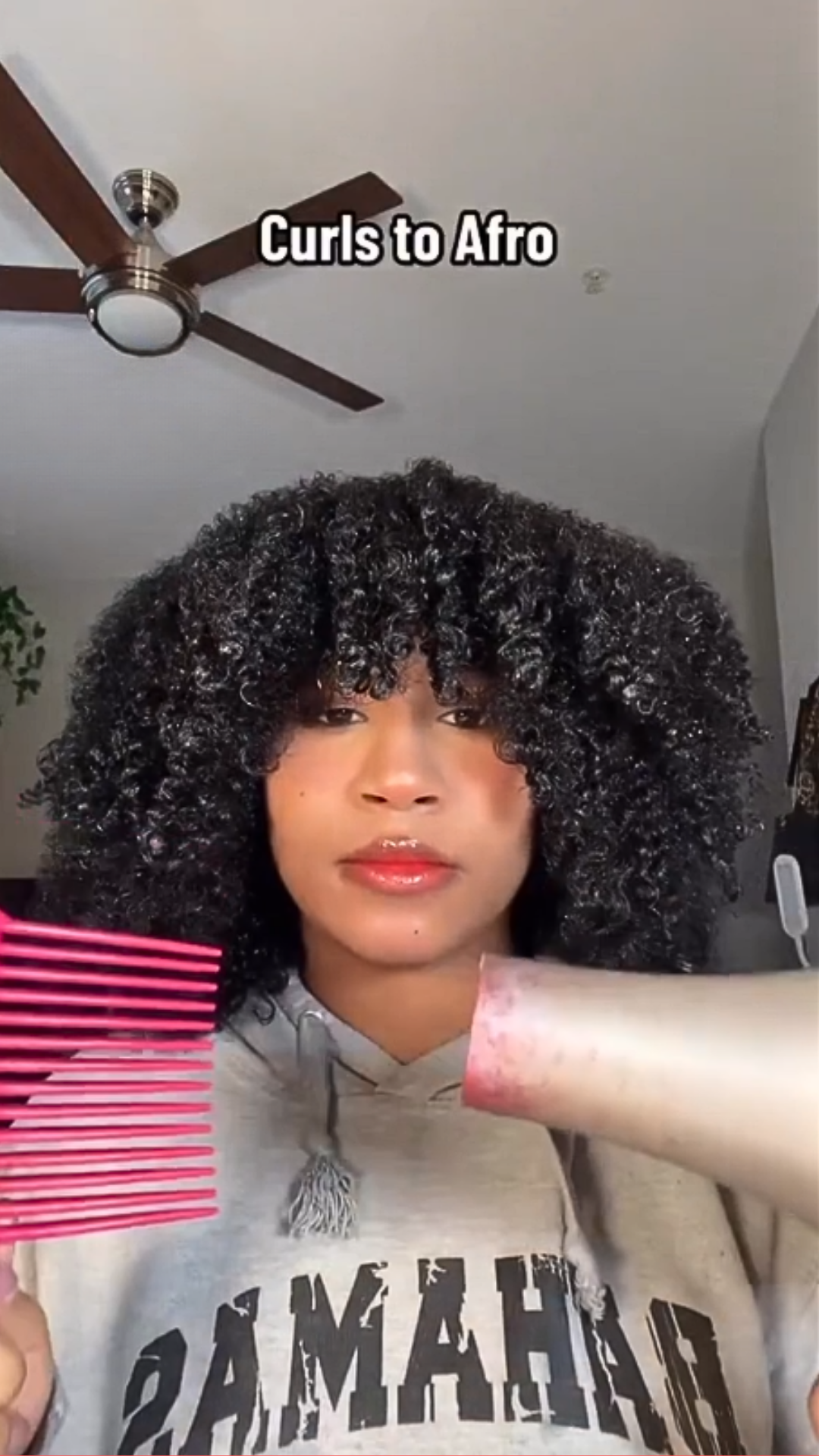 Curls to Afro hair transformation look