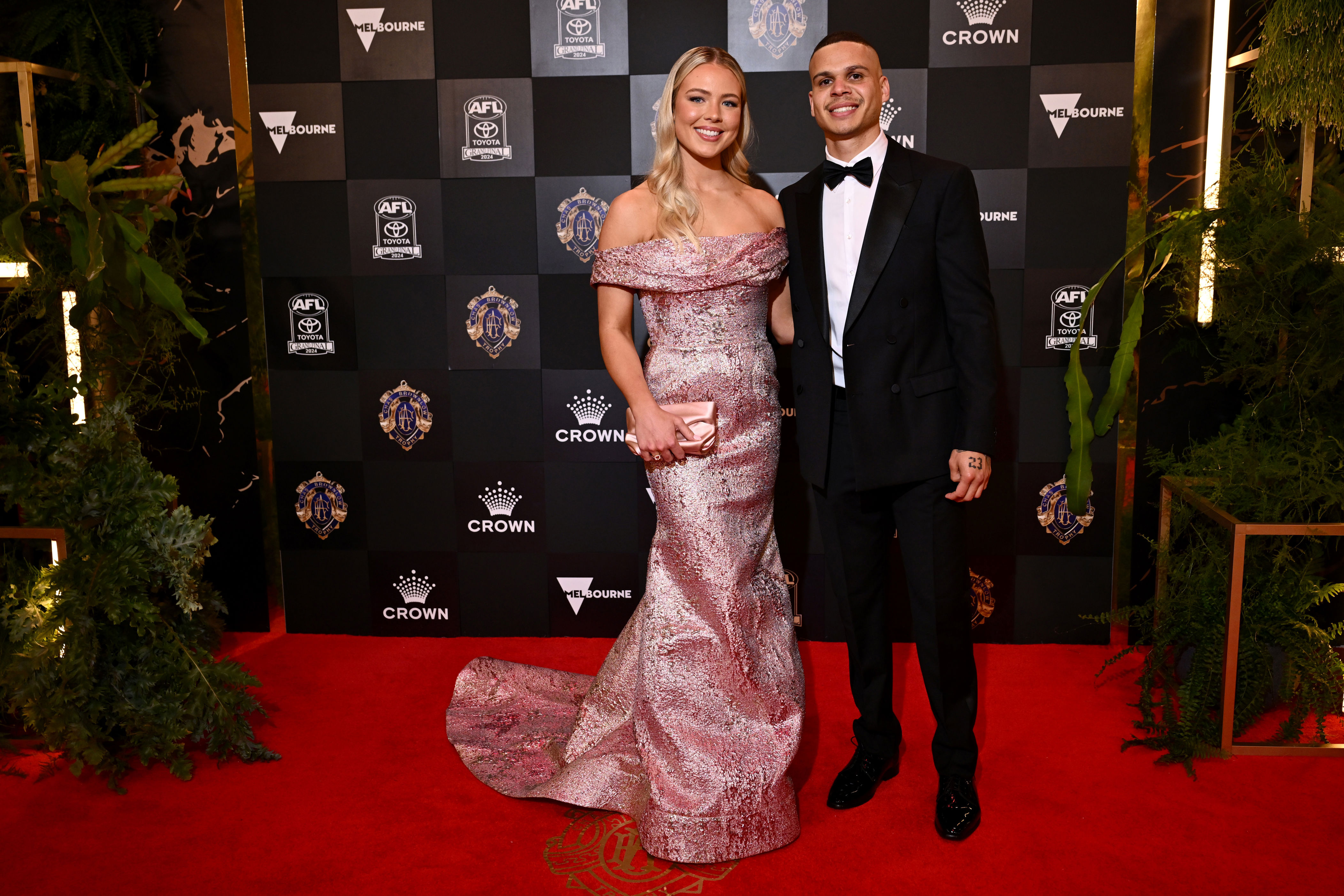 AFL player and partner welcome their third child almost a year on from ...