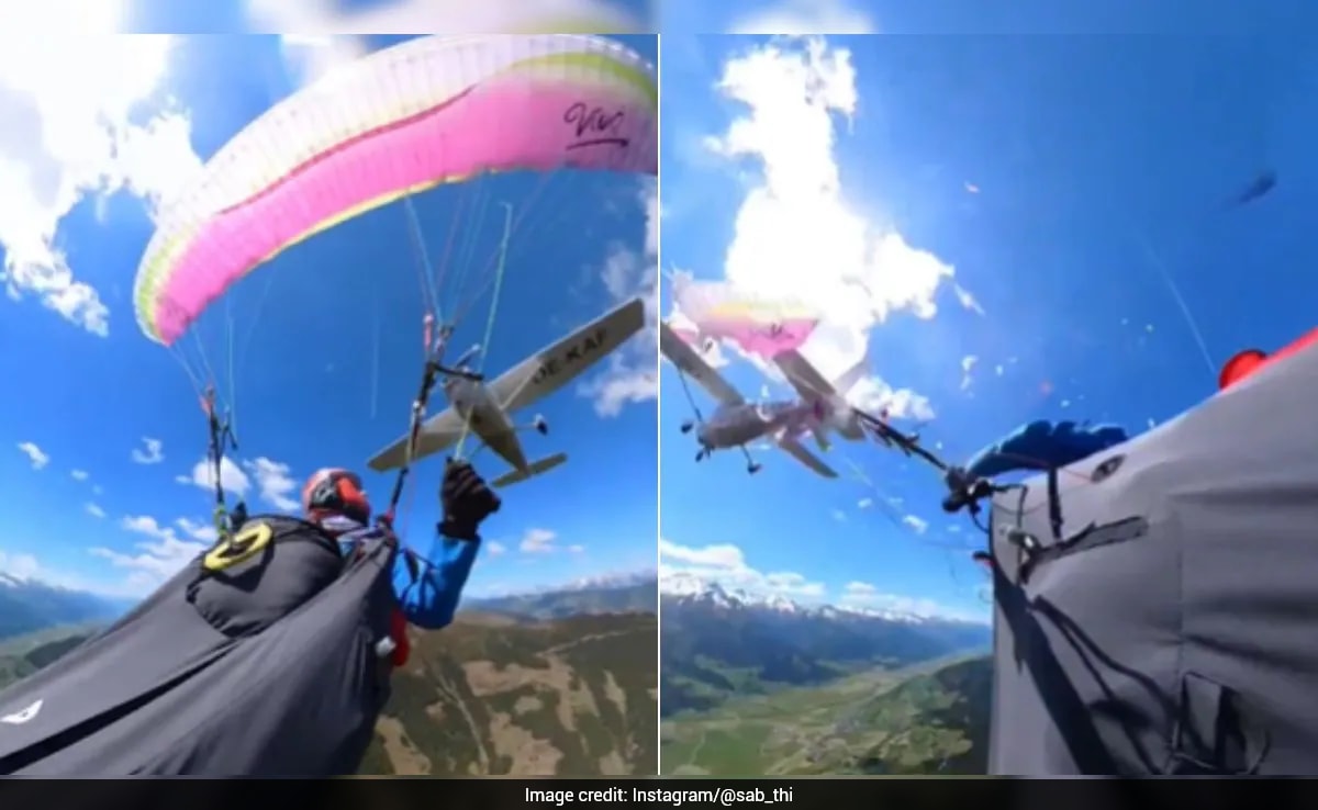 Plane hits paraglider mid-air, tears through canopy in shocking video