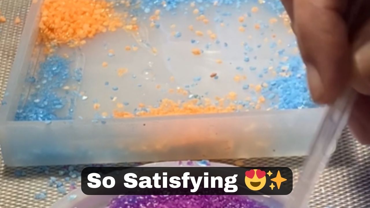 Epoxy resin art demonstrates dynamic pigment patterns during pour