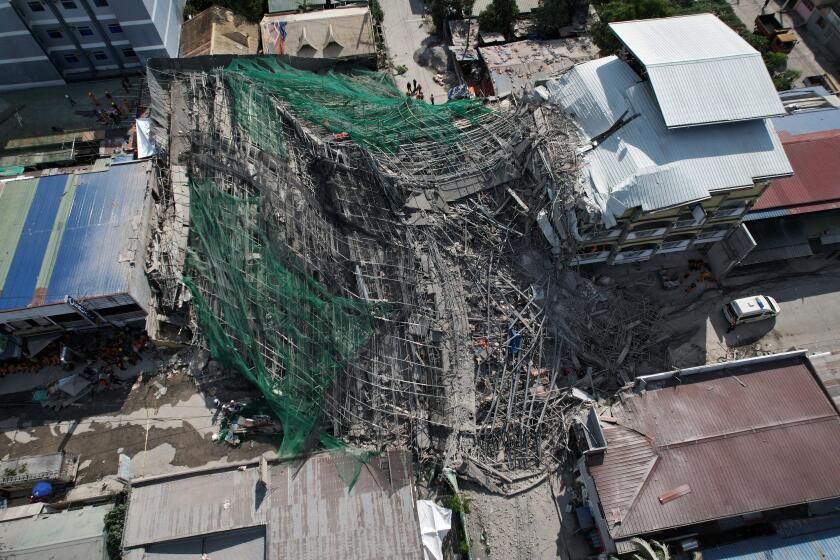 Building under construction in Philippines collapses, leaving 1 dead ...
