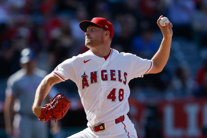 Reid Detmers strikes out 14, Angels score walk-off run on errant throw ...