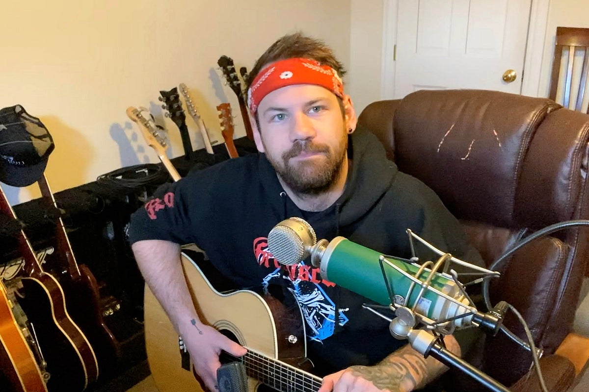 Rock singer’s wife of 14 years reacts after he comes out as gay