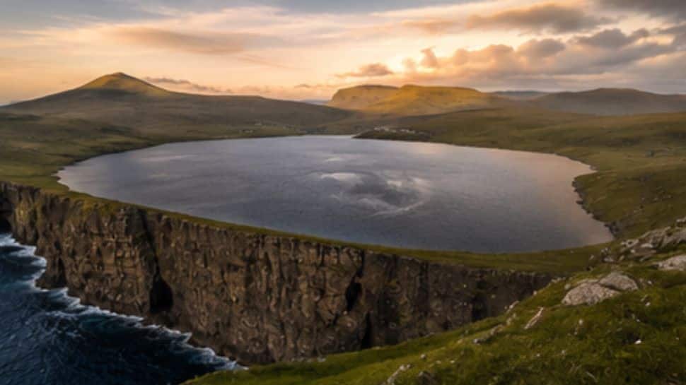 Floating lake or illusion? This loch appears floating above ocean - Did ...