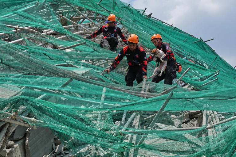 At least three dead and many people missing after major hotel collapse