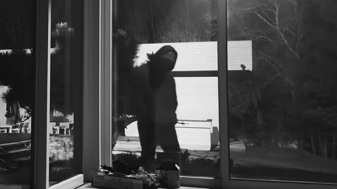 A chilling figure outside the home turns into a late-night security alarm