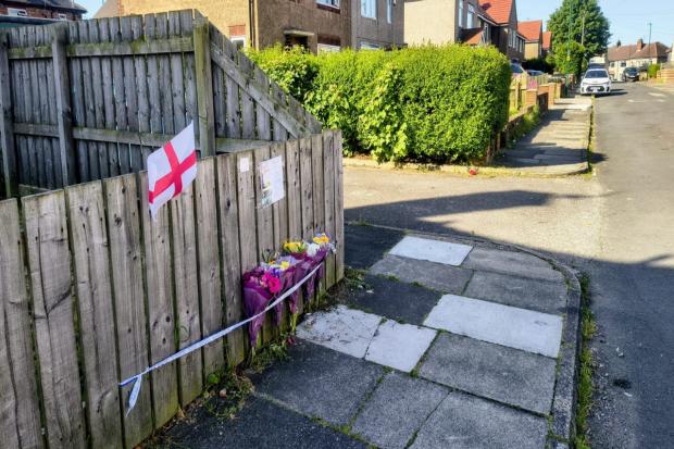 Floral tributes left at scene of alleged murder after man dies and ...