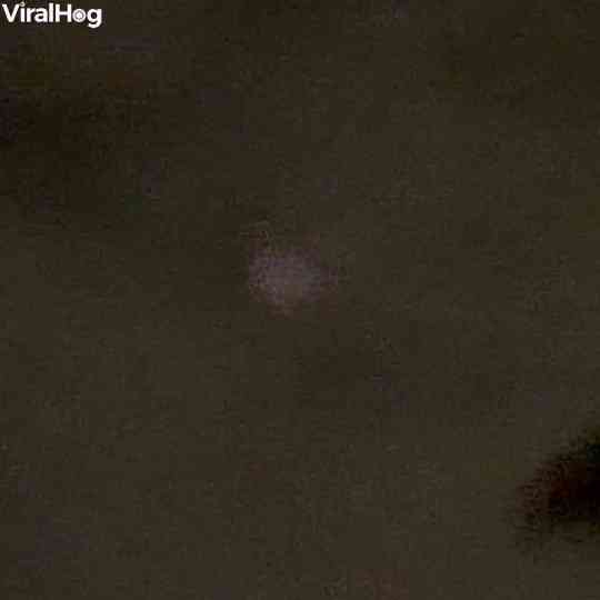 Unknown object changes shape and color in the sky