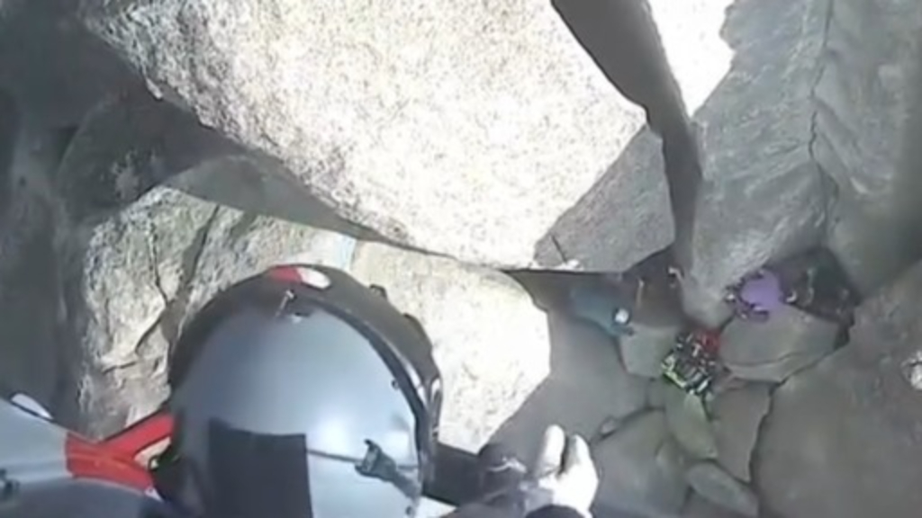 Death-defying rescue after climber falls eight metres on remote peak