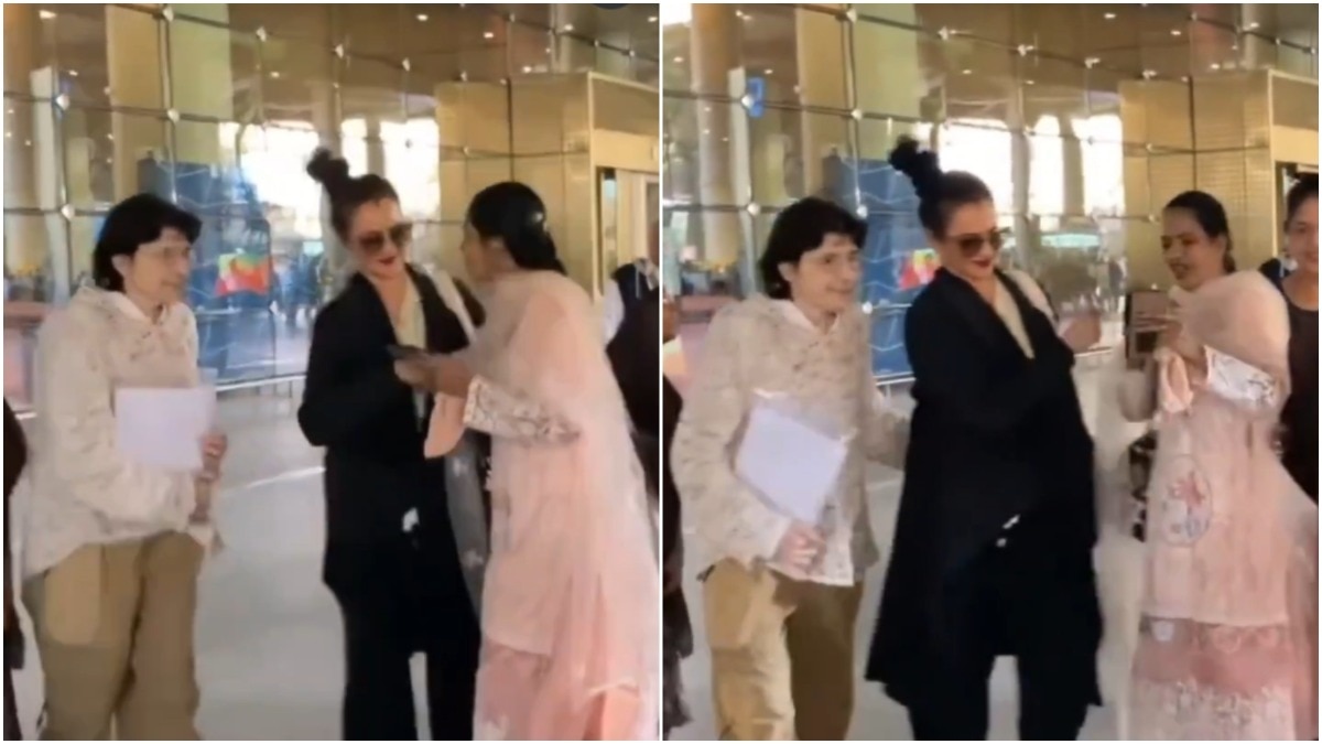 Rekha shoves past fan at airport in old viral video. Internet divided ...