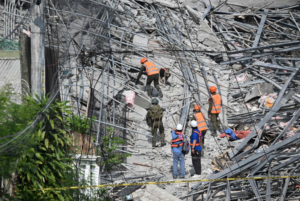 Malaysian killed by falling debris in Philippine building collapse