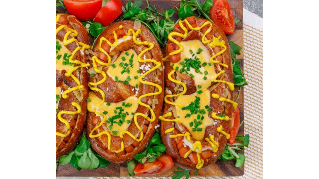 Cheesy griddled hot dogs with pretzel buns recipe