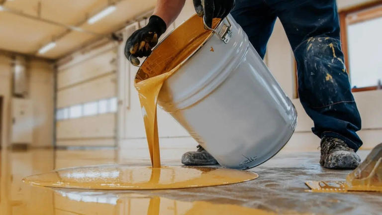 What is epoxy flooring and why do some experts suggest avoiding it?