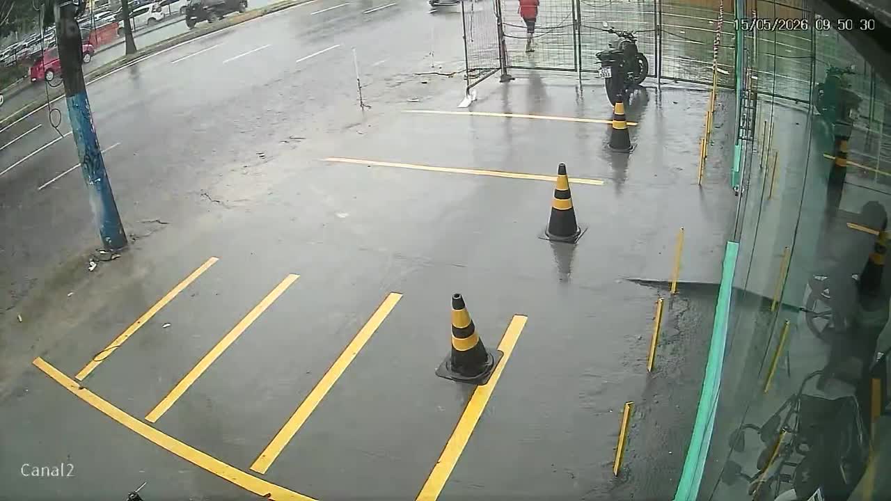 Delivery rider thrown from bike after hitting hidden pothole in flooded ...