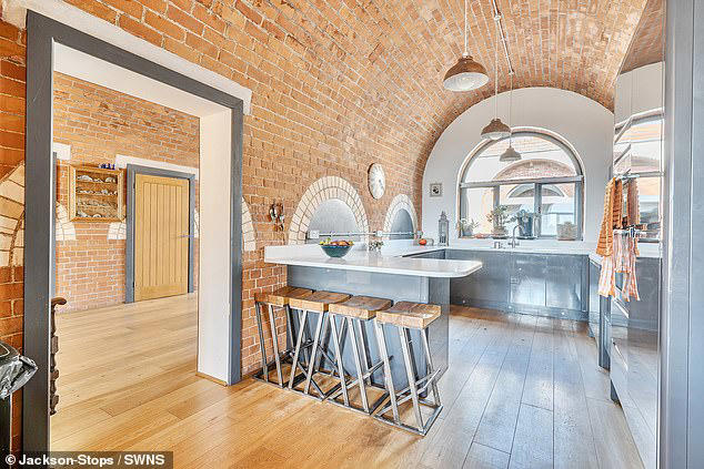 Underground water reservoir converted into unique four-bedroom home ...