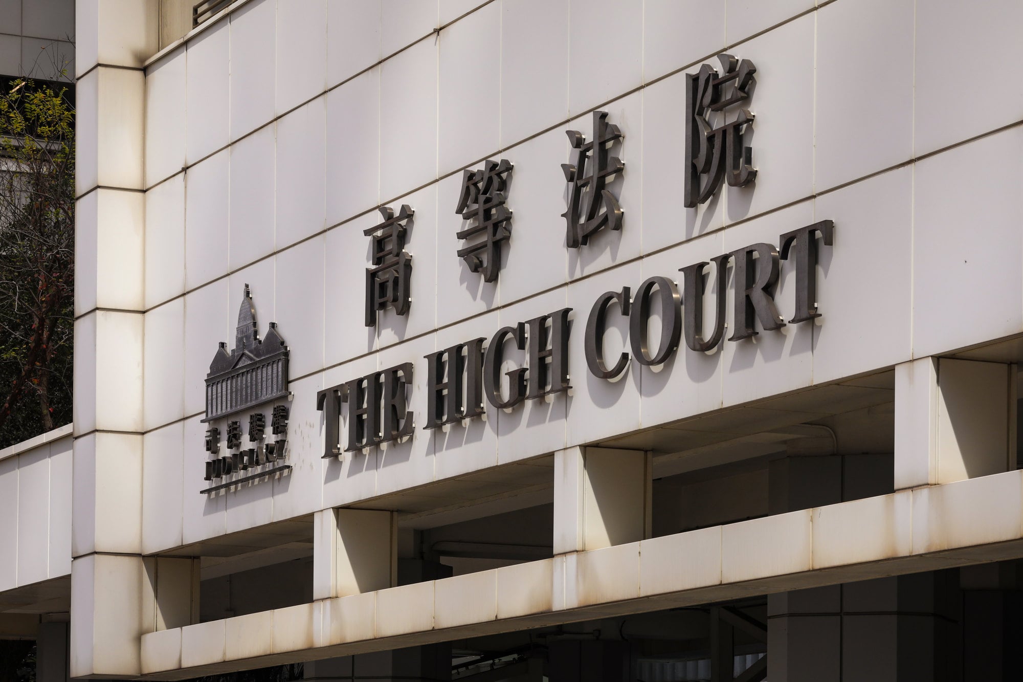 Hong Kong court freezes HK$9 billion in assets and properties tied to ...