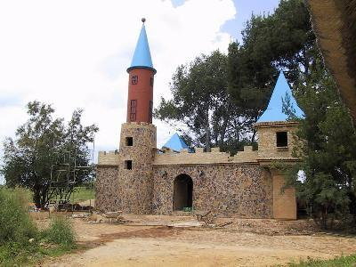 Dad built daughter huge castle with moat, dungeon and slide