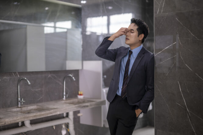 Why every office has a ‘loo lurker,’ and no one really talks about it